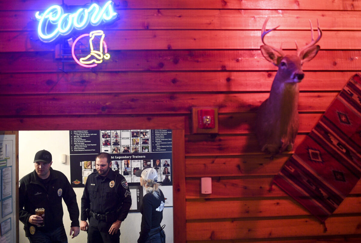 Lehi police bus tables for a cause | News, Sports, Jobs - Daily Herald